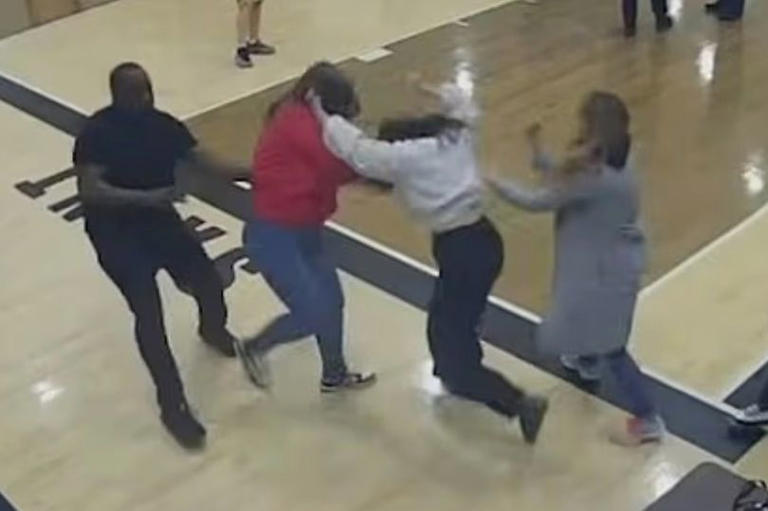 Astonishing footage shows brawling moms spill onto court and interrupt ...