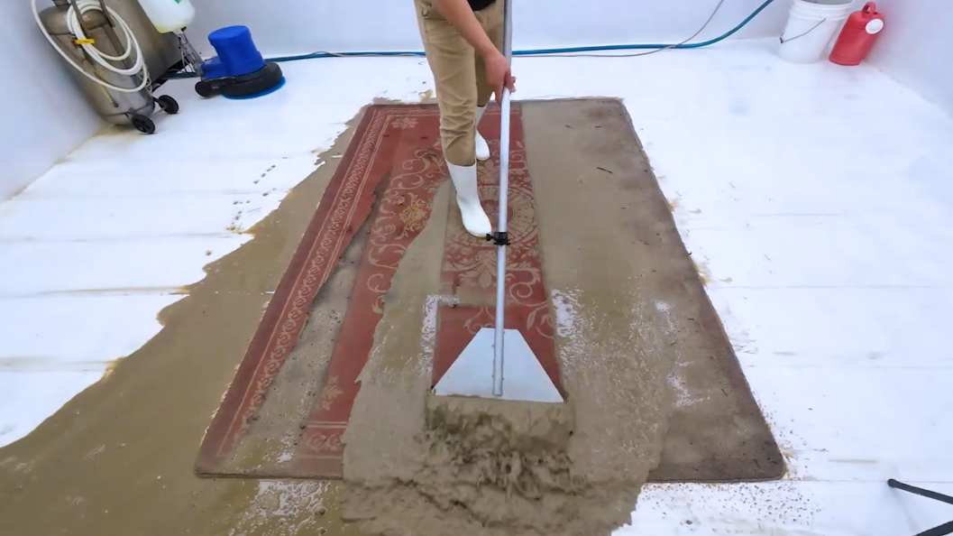 One straight pull reveals the carpet beneath