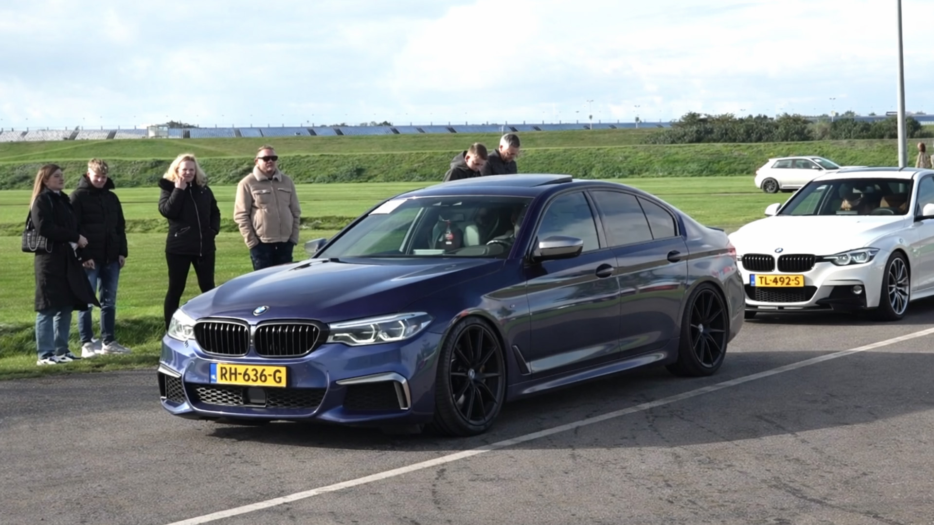 Drag racing a custom exhaust BMW M550i
