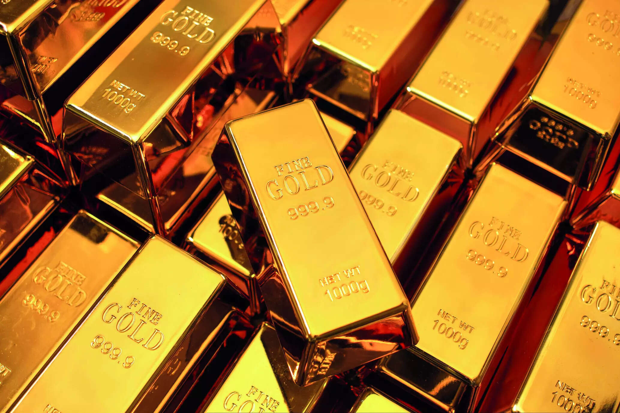 Gold falls over 1% as profit-taking, easing geopolitical risks weigh
