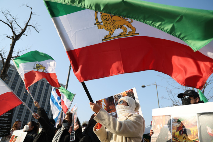 Iranians waving flags