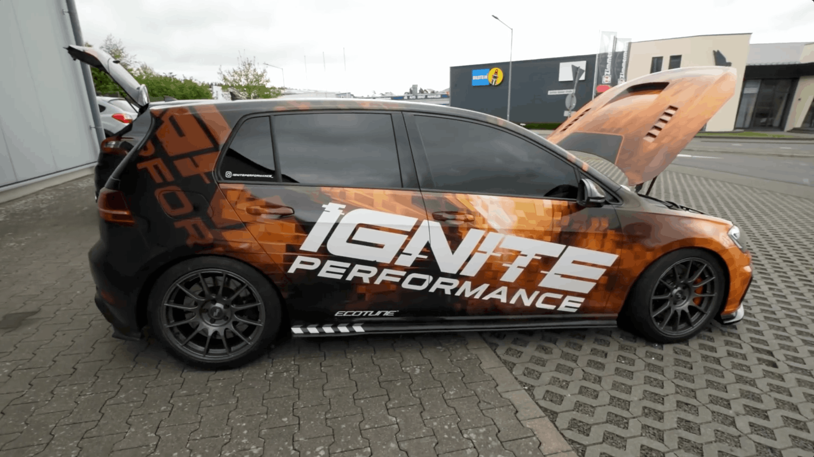 Close encounter on racetrack with tuned sports hatch