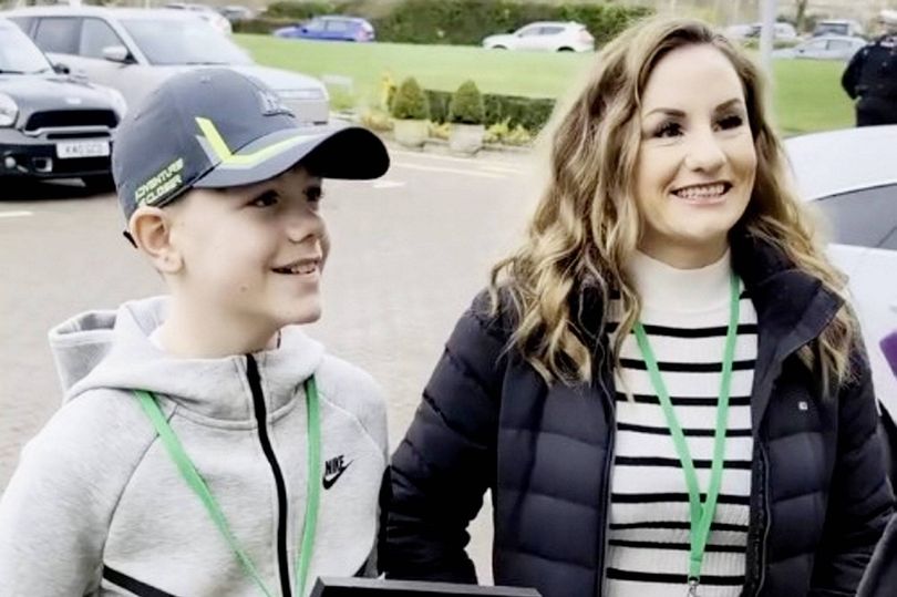 Moment boy, 12, saves mum's life by dialling 999 after mum faints at 60mph