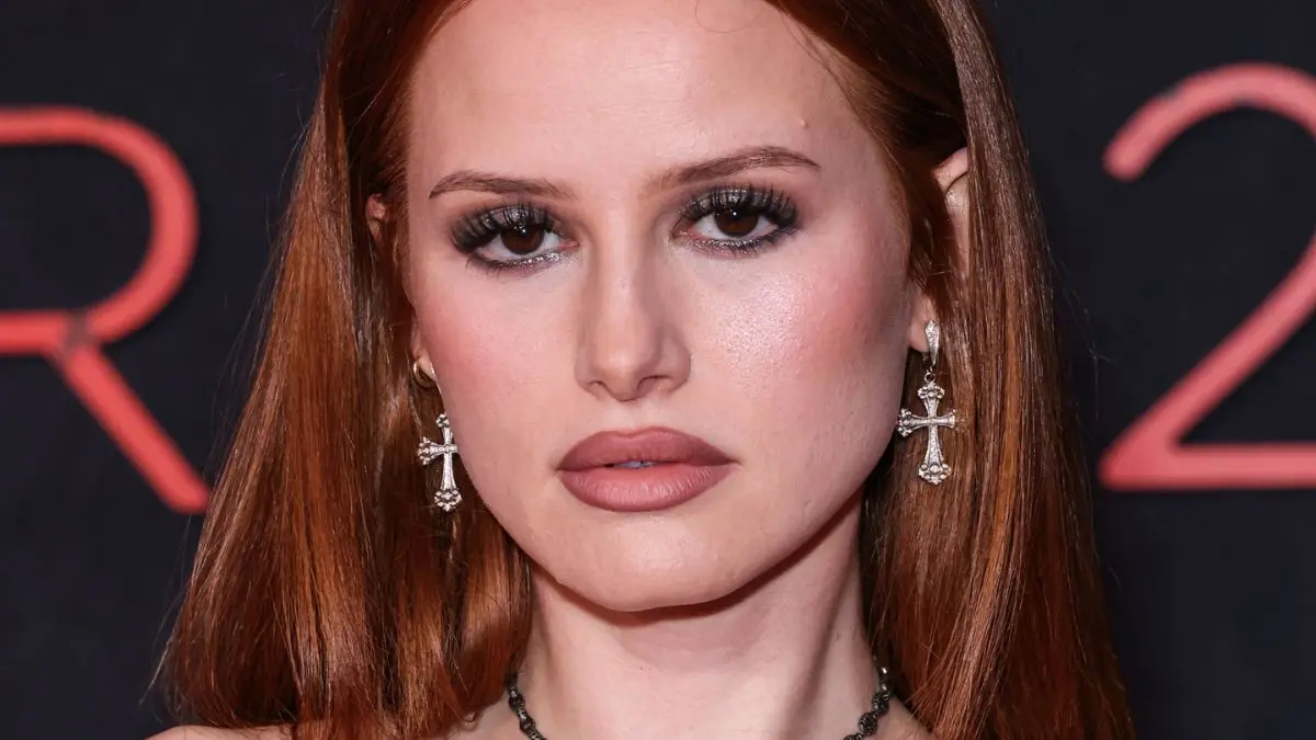 Red-hot Madelaine Petsch stuns in sultry dress at 'The Strangers' premiere