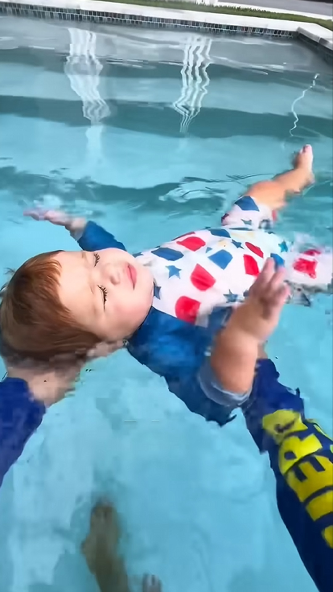 Teaching pool floating skills to a young child