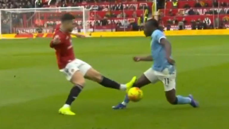 Man City boss Guardiola makes feelings clear on Dalot escaping red card ...