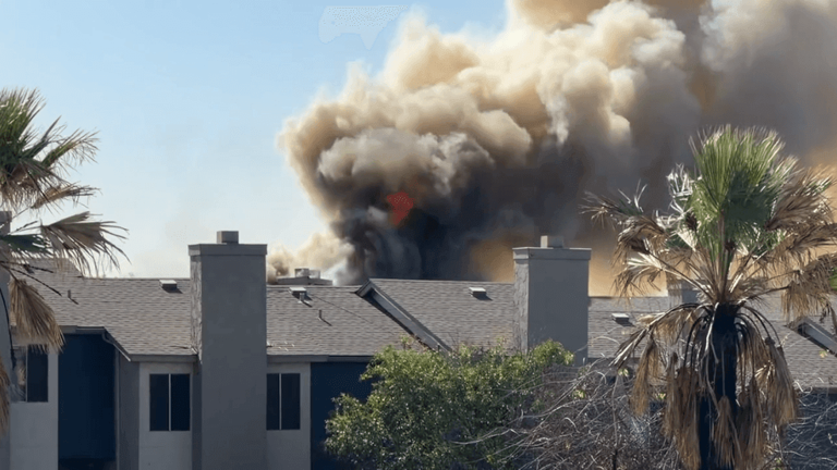 Crews fight back flames at two story apartment complex fire, residents ...