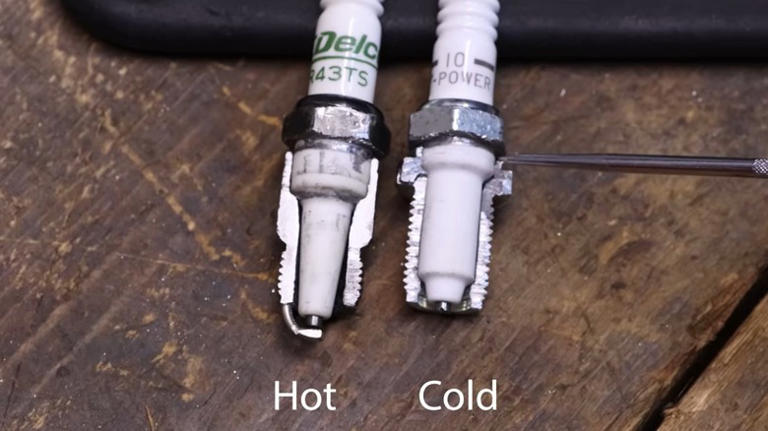 Why do spark plugs have different tip shapes and what are the differences?