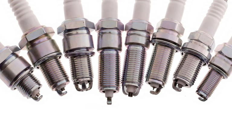 Why do spark plugs have different tip shapes and what are the differences?