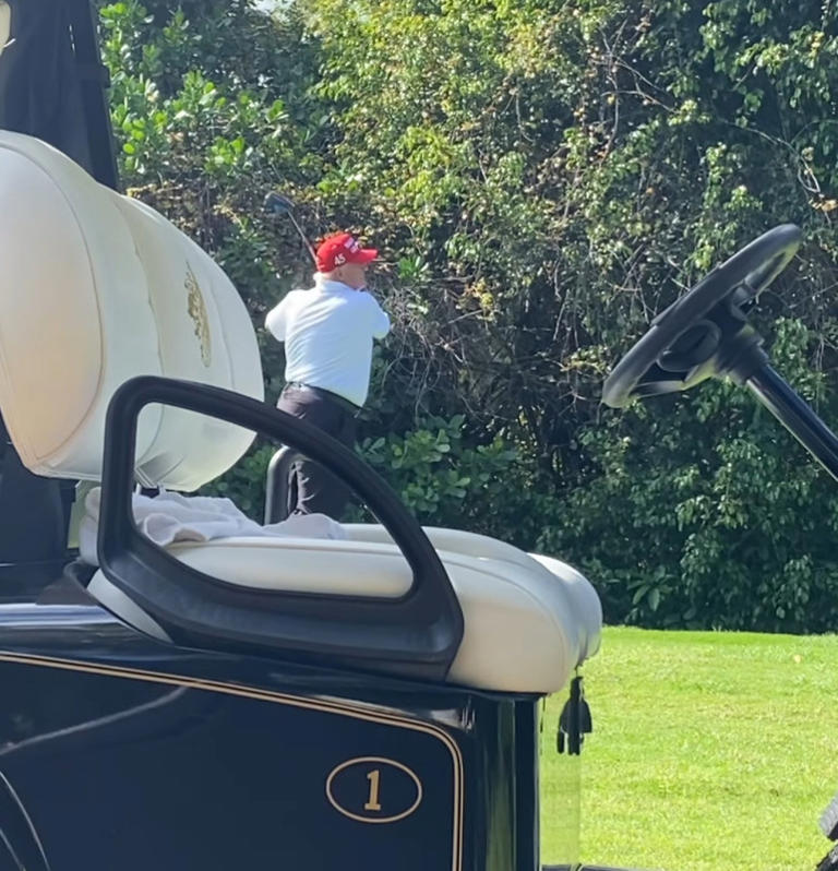 Trump visits golf club shielded from public view