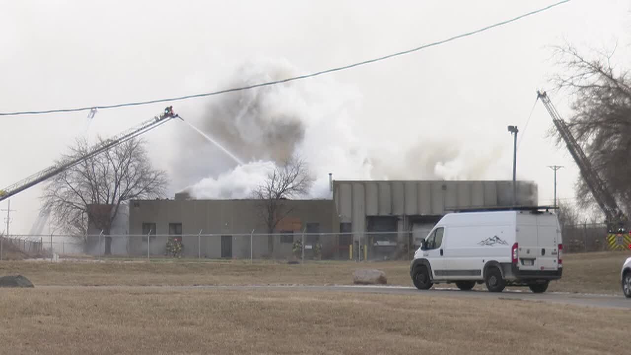 Crews respond to three-alarm fire at South Omaha warehouse