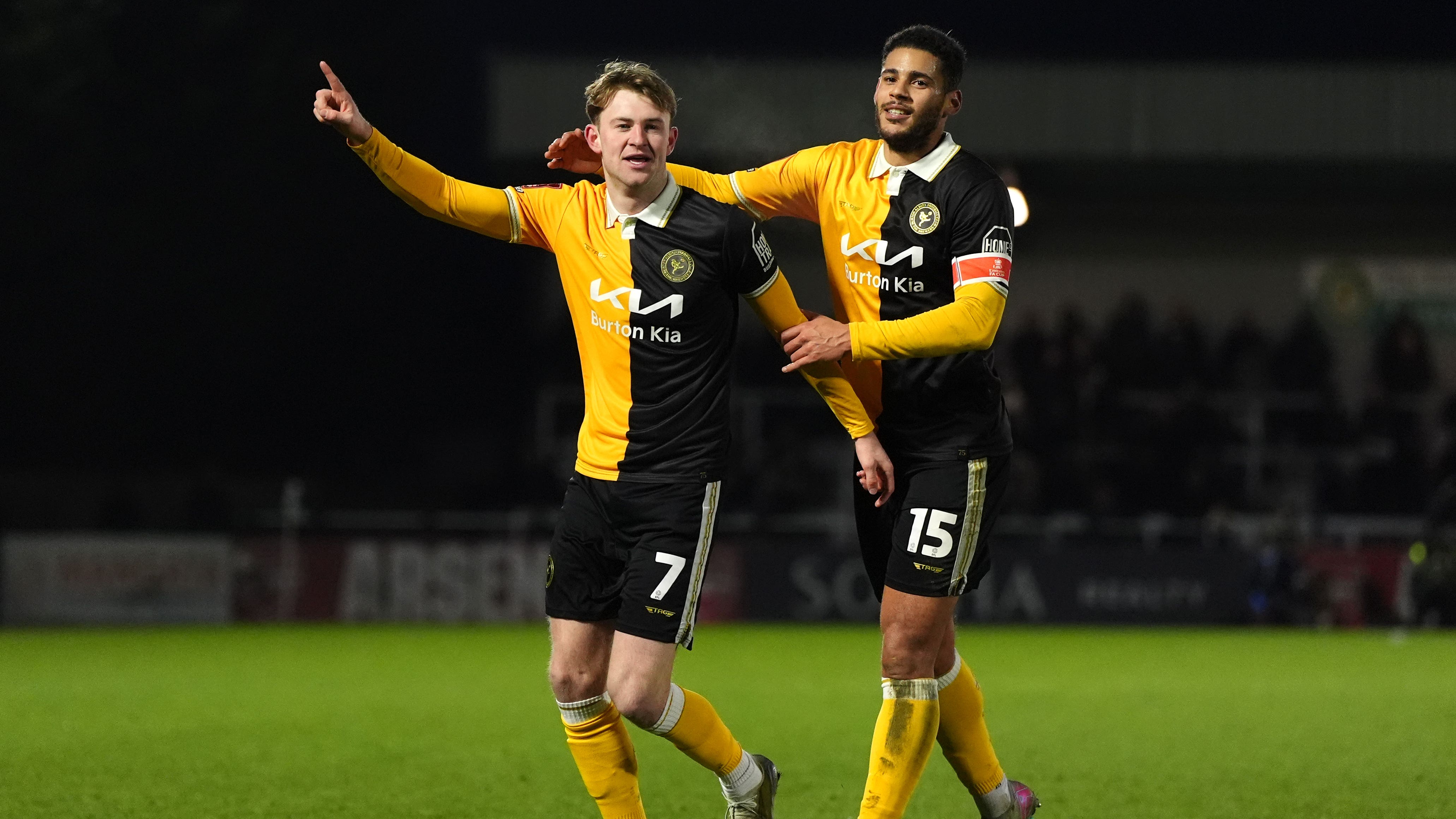 Burton stun Huddersfield to climb out of relegation zone