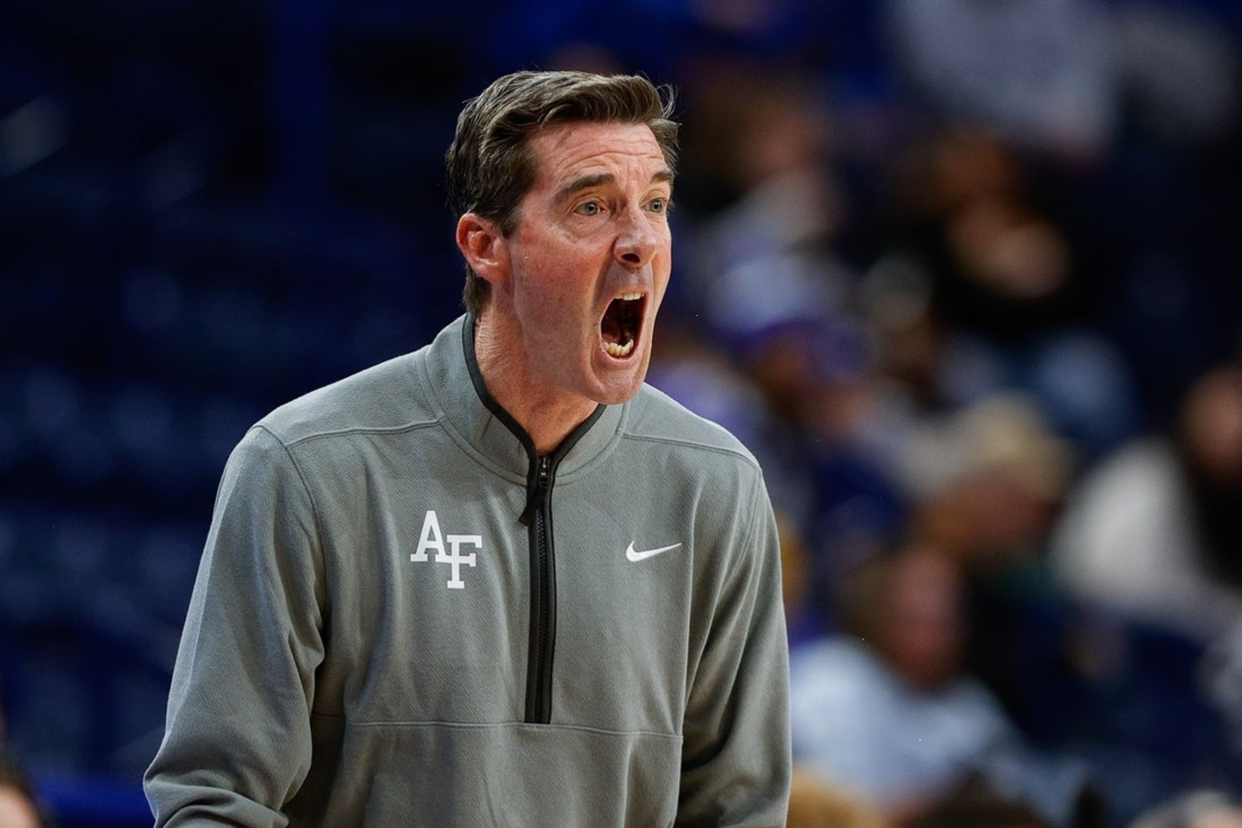 Air Force suspends coach Joe Scott during player-treatment probe
