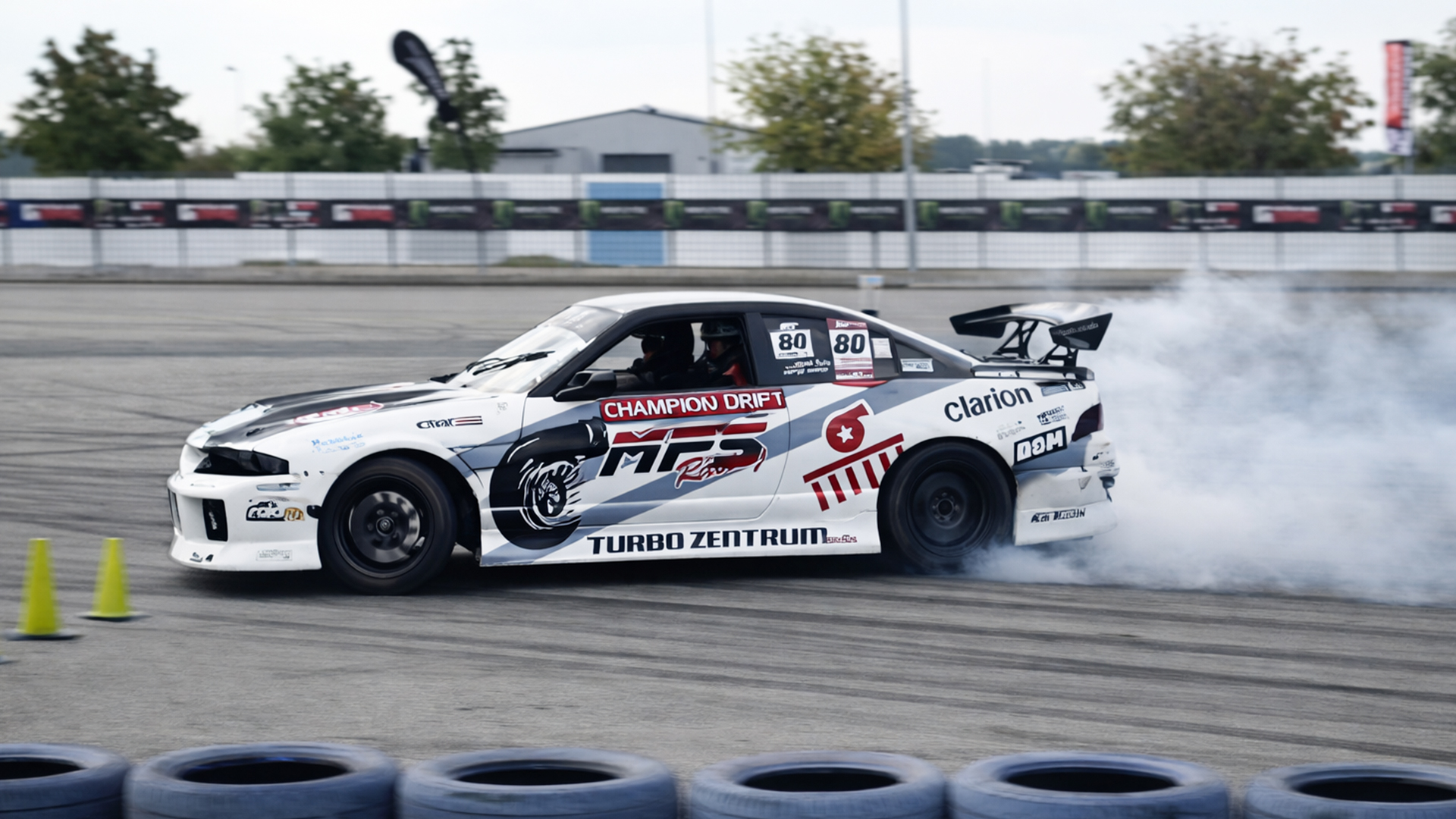 Nissan Skyline R33 in full drift with smoke