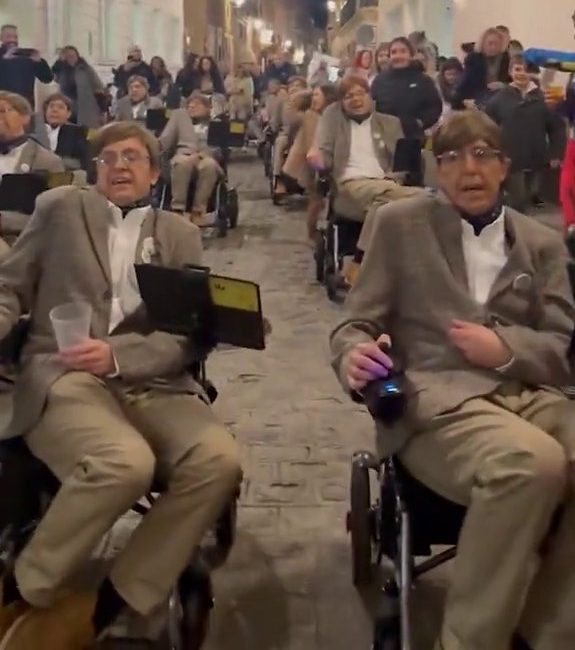 Performers dress as Stephen Hawking for charity stunt