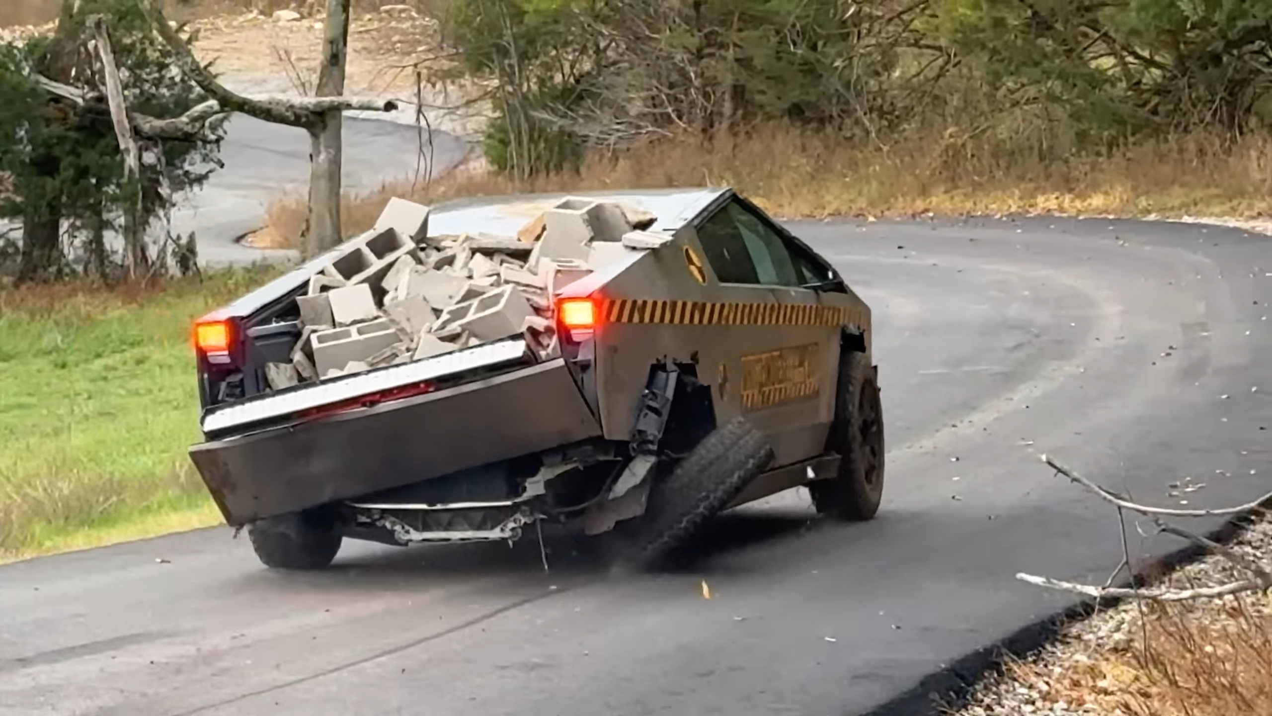 We put 3,000 lbs in the back of a Cybertruck - it almost snapped in half