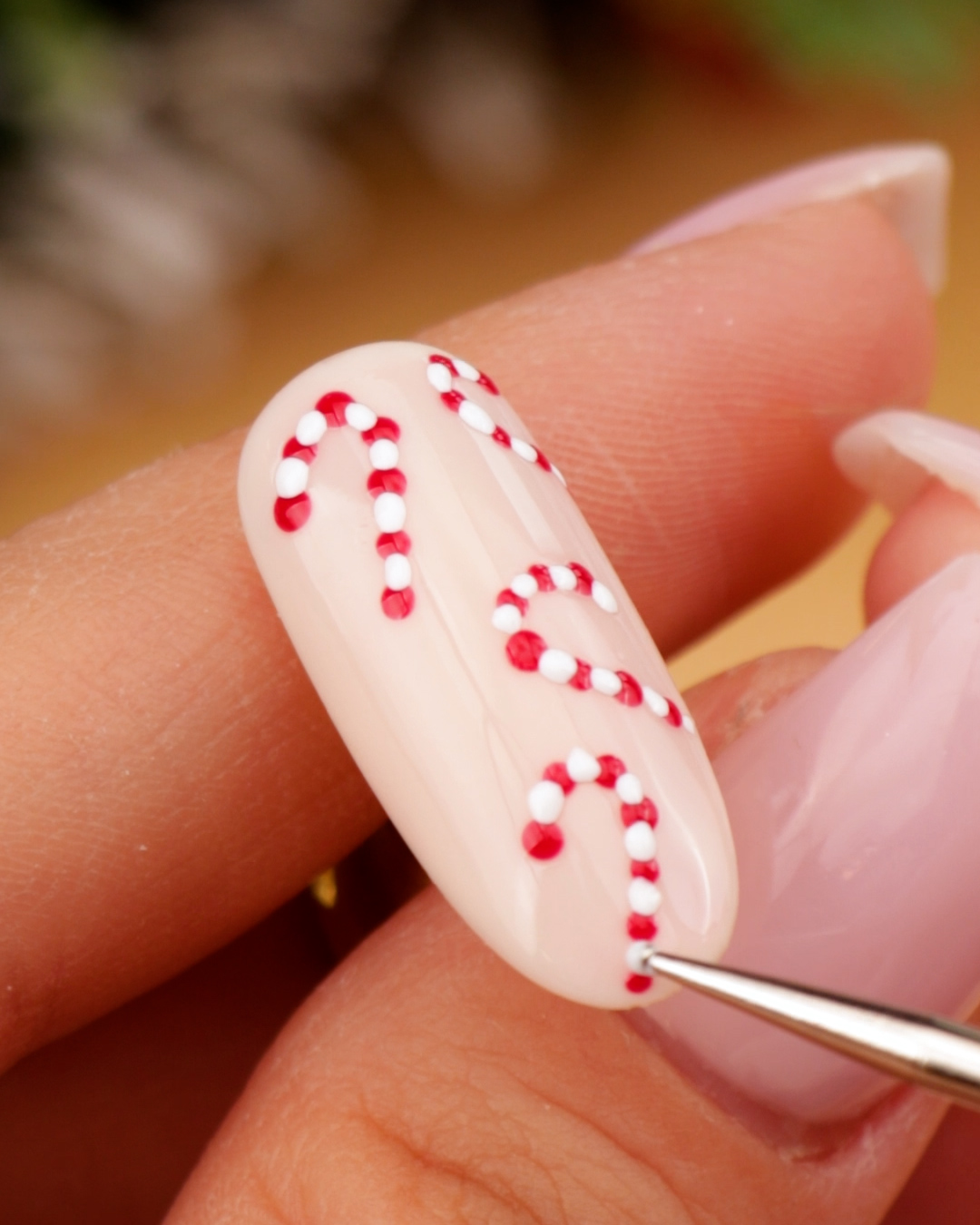Celebrating Christmas with festive candy cane nails💅