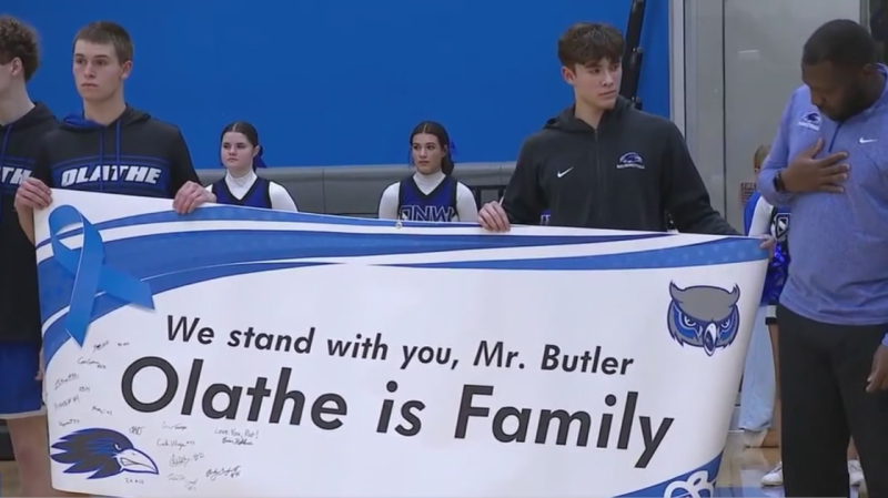 Kansas students come together to show support for athletic director ...