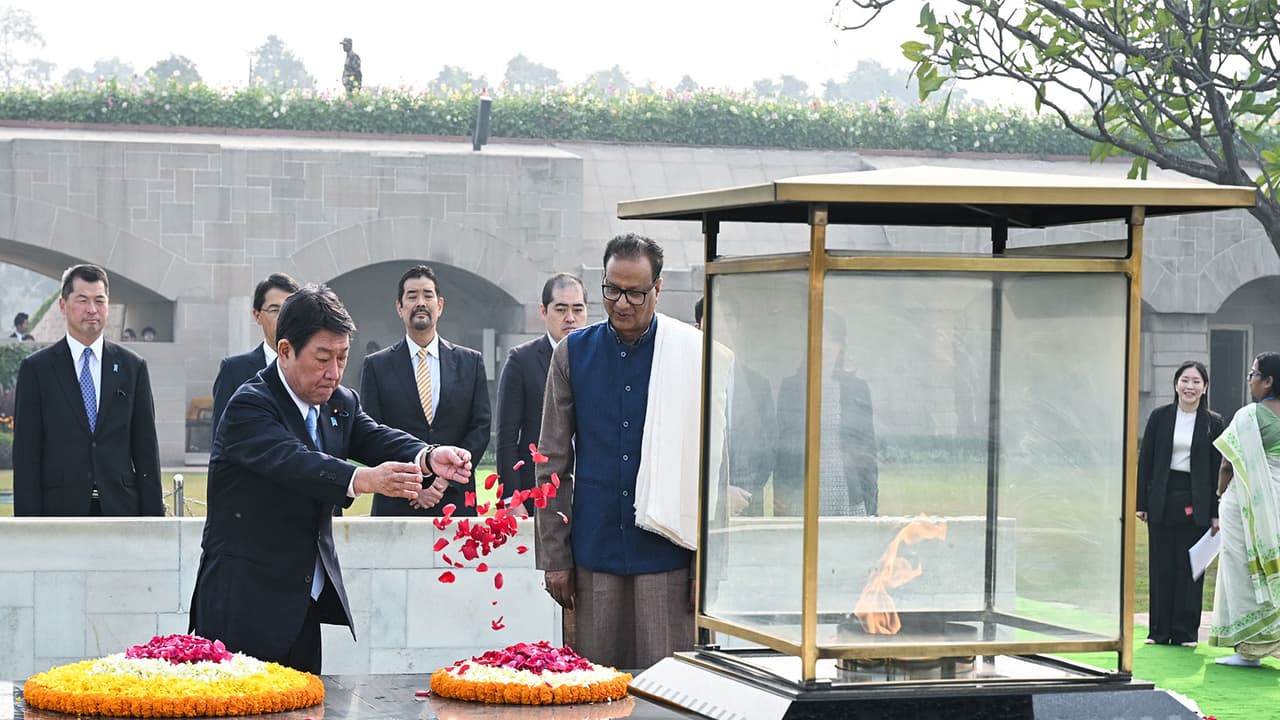 Japanese FM Motegi pays tribute to Gandhi, rides Delhi Metro in India