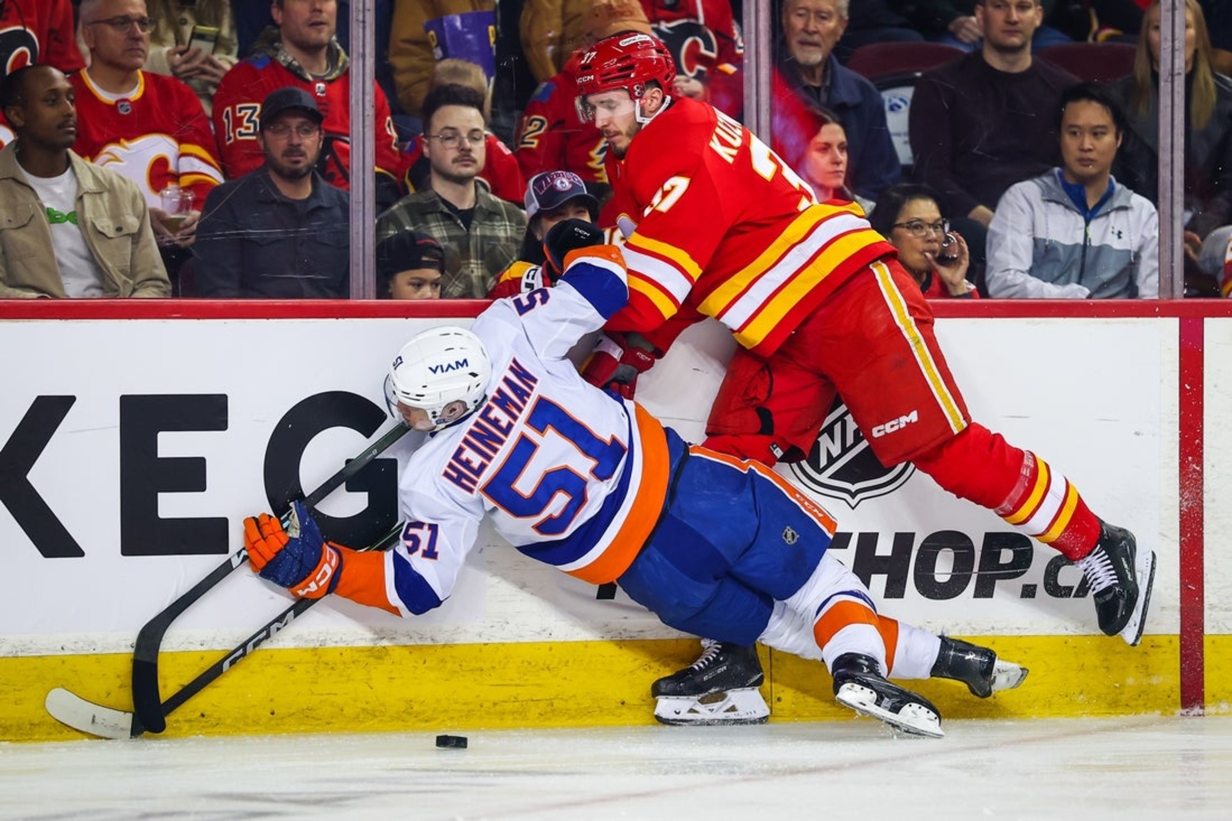 Flames race ahead early, handle Islanders to start homestand