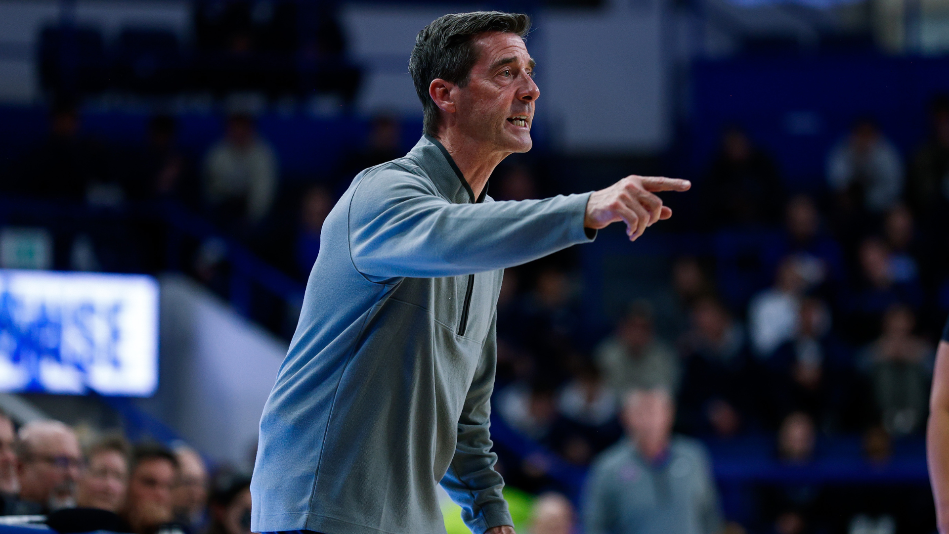 Air Force basketball coach Joe Scott suspended amid investigation into ...