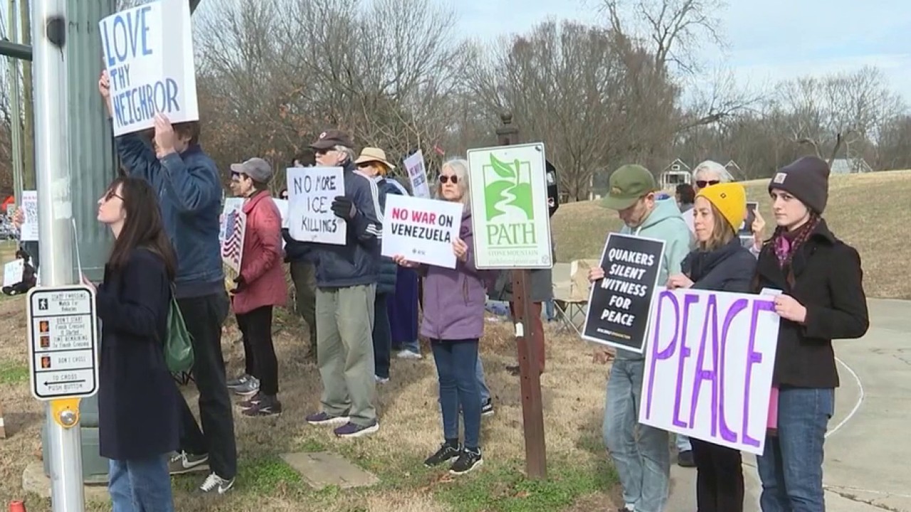 Anti-ICE protesters gather at Freedom Park