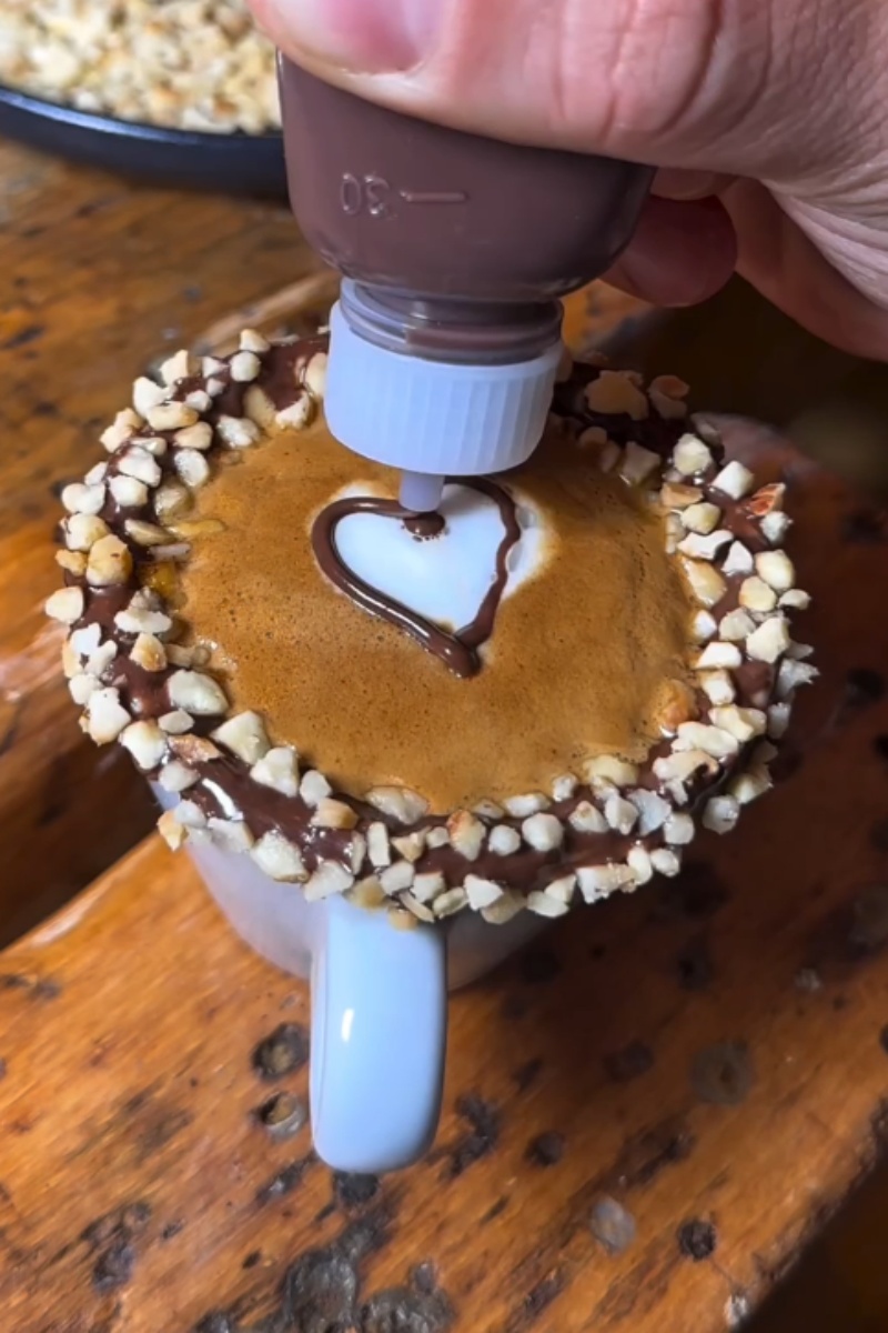 Heart latte art with nuts