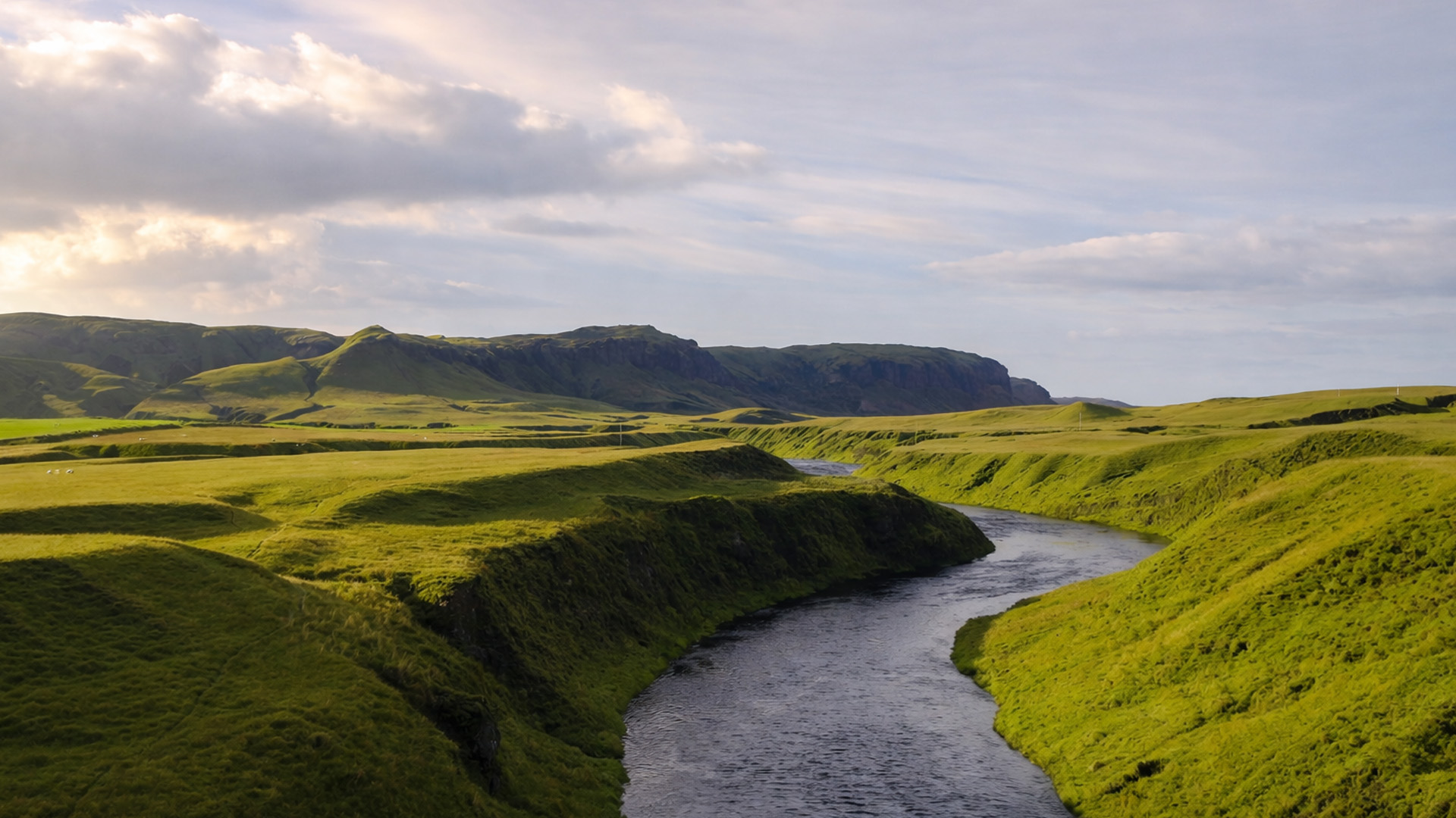 Flowing through Iceland’s green plains