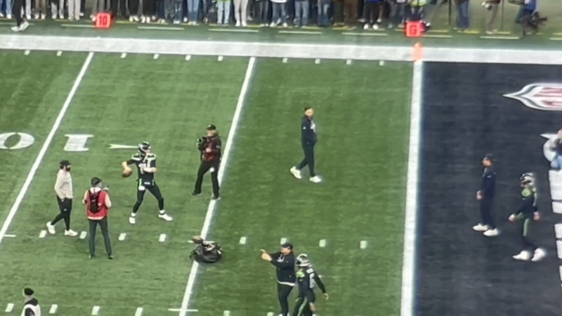 Sam Darnold warms up as usual in pregame before Seahawks playoff vs 49ers