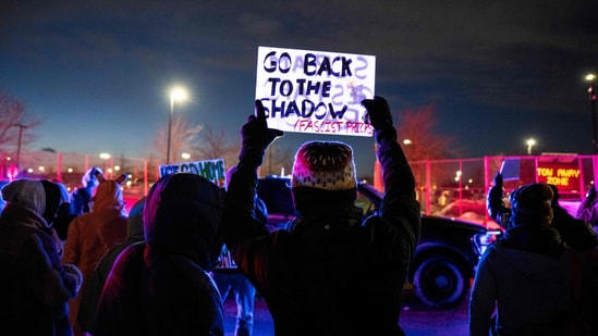 ‘Wish your mother loved you’: Protesters taunt ICE agents outside ...