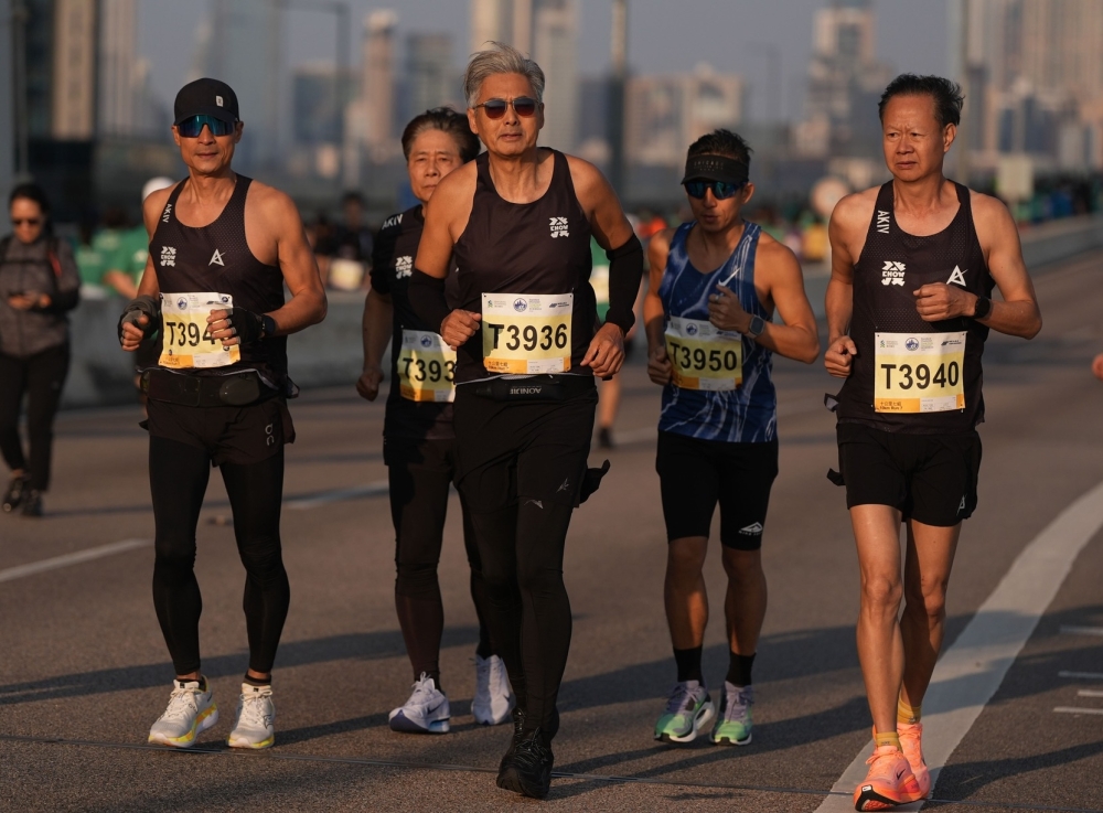 Still running the show: Chow Yun-fat, 70, crosses HK Marathon 10km line ...