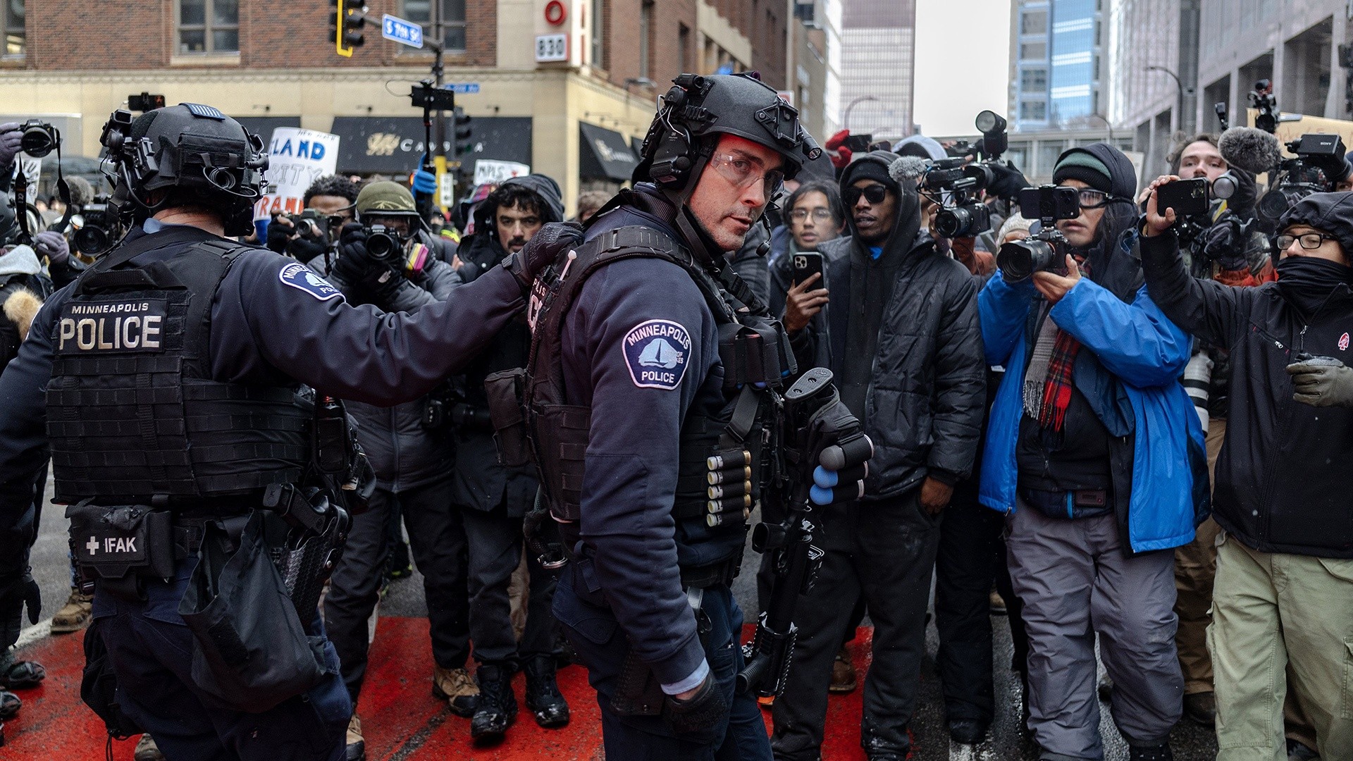 Tensions rise in protests over Minnesota ICE shooting