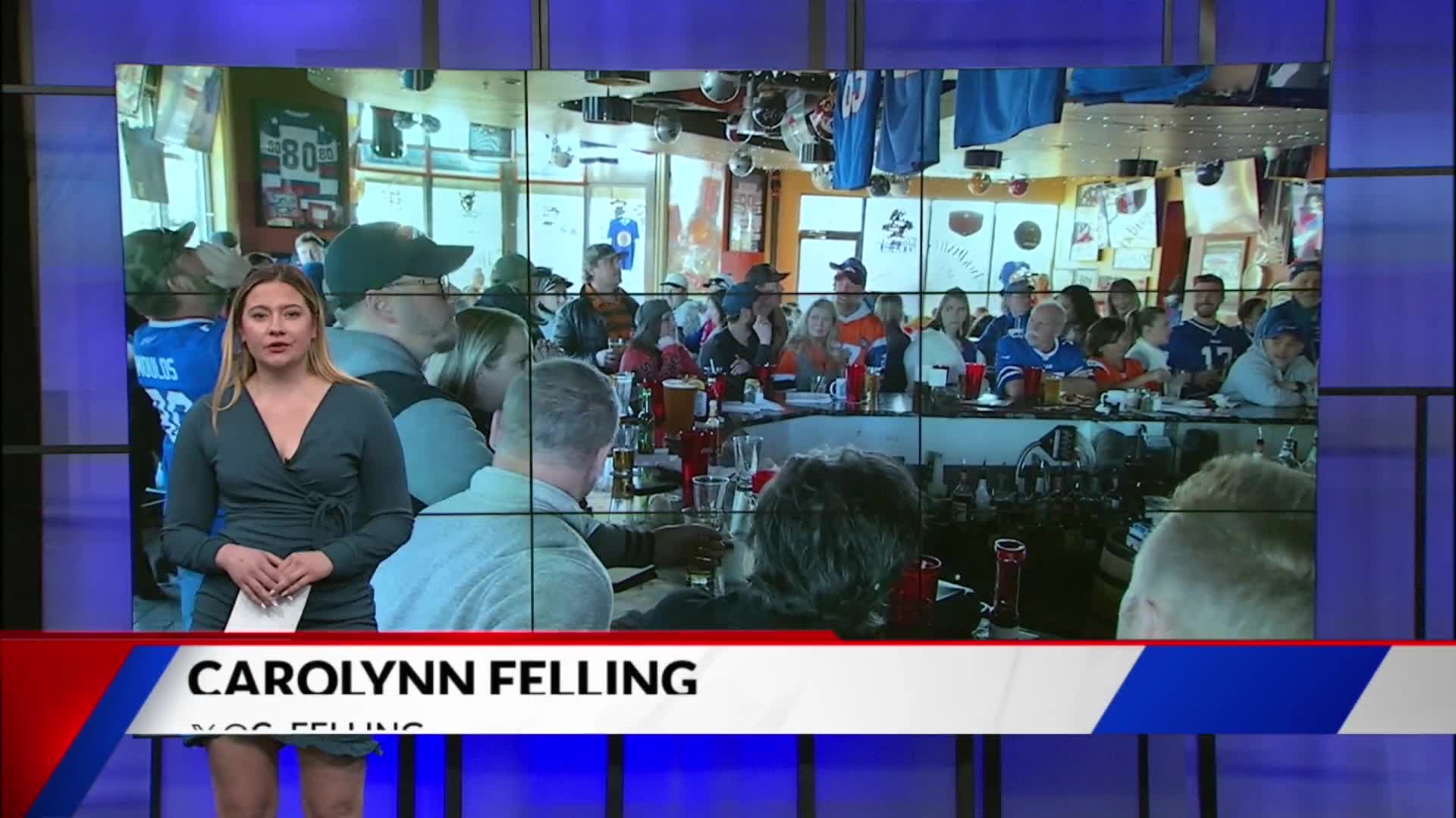 Broncos and Bills fans side by side at local bar for playoff game