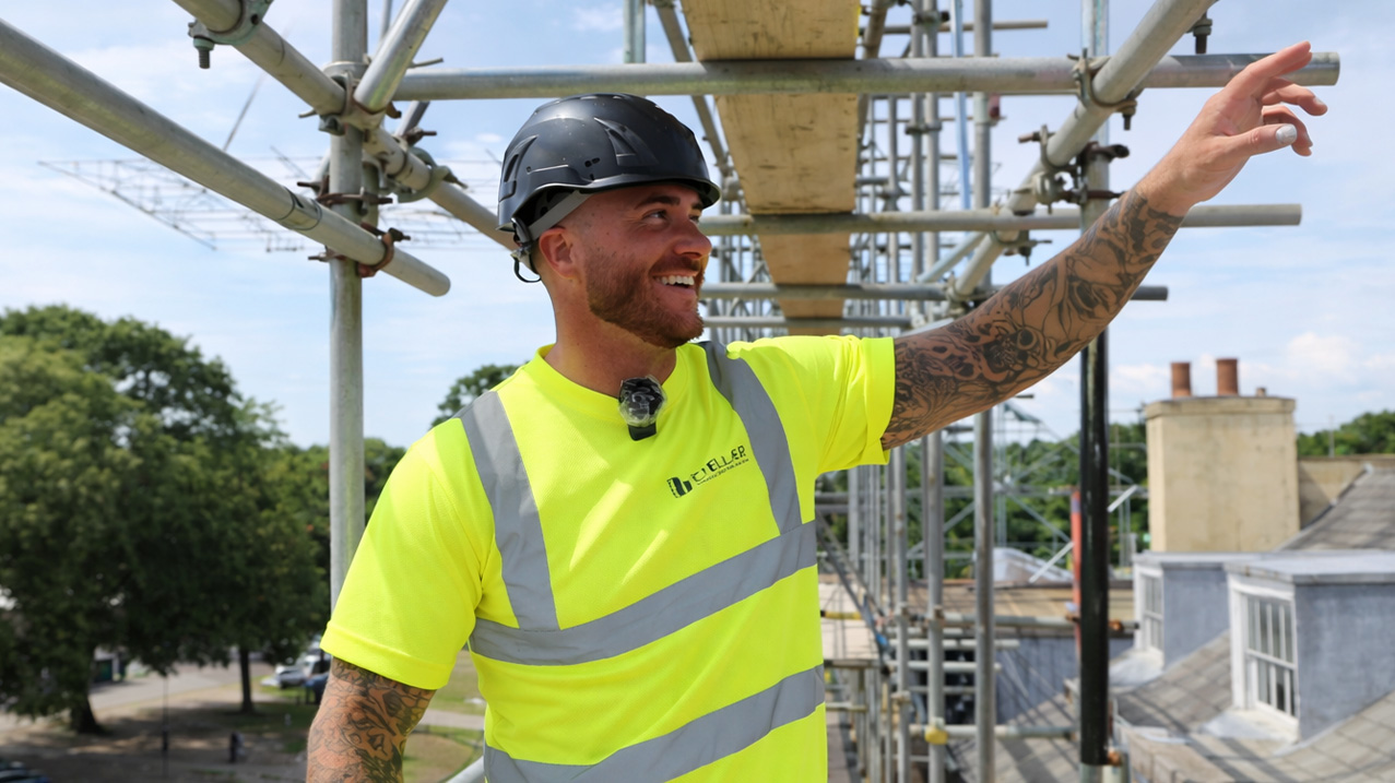 Putting all the scaffolding beams sections on the roof