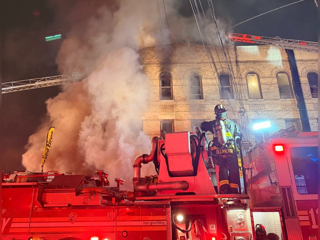 Queens: Three-alarm fire rips through tire shop
