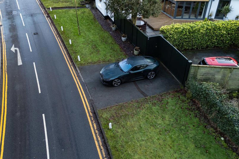 Man is fined £35 for parking outside his own house