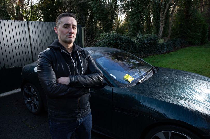 Man is fined £35 for parking outside his own house
