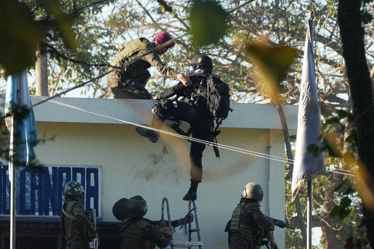 Guatemalan police free hostages in prison as attacks kill 3 officers