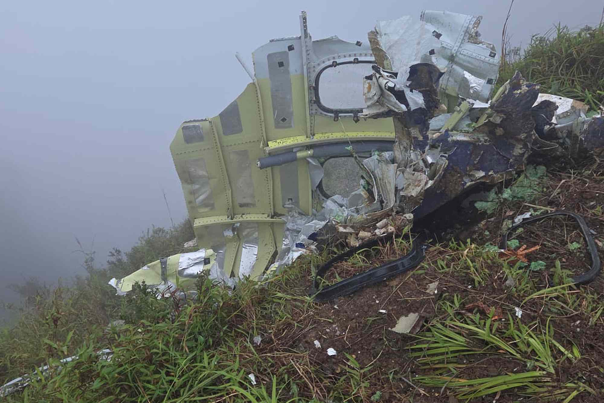 1 person confirmed dead, 10 others remain missing after debris of plane ...