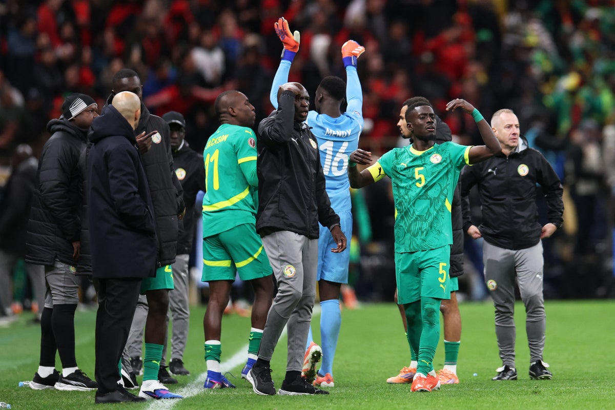Senegal lead Morocco in extra time as Afcon final plunges into chaos