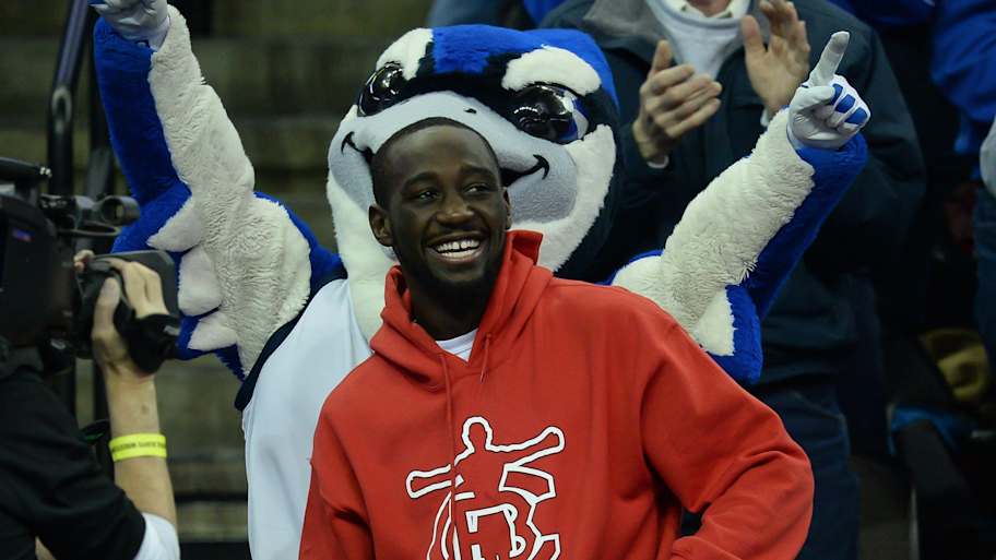 Boxing legend Terence Crawford watches son wrestle