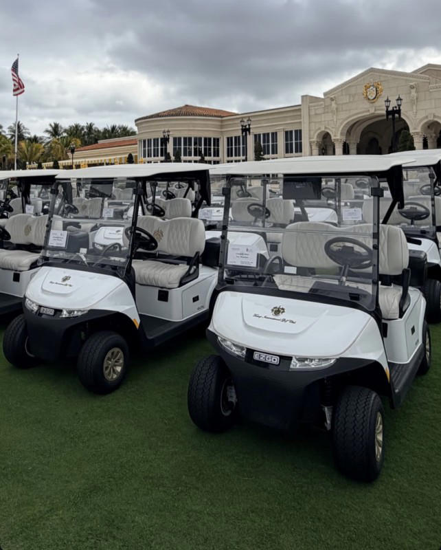 ICE out protest sign confronts Trump outside golf club