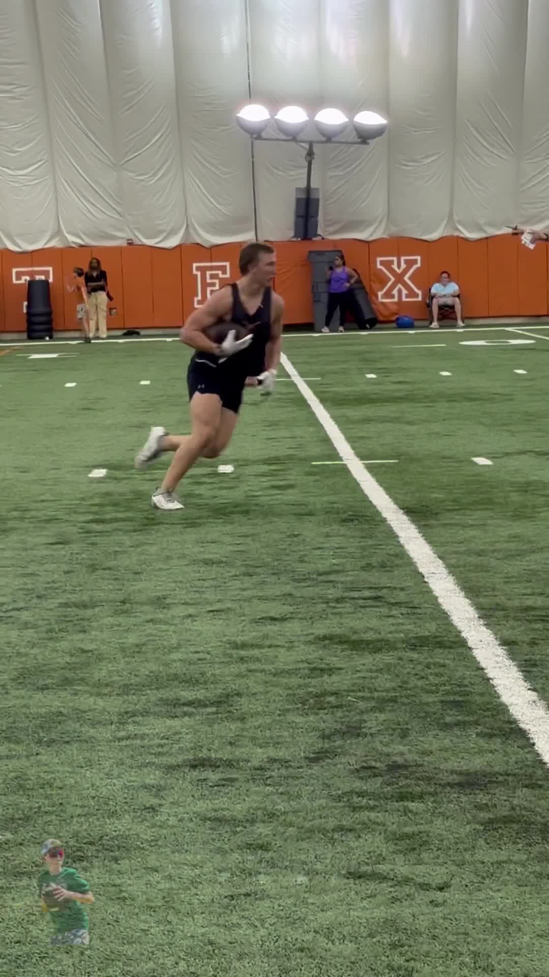 Football drills and skill development at University of Texas camp