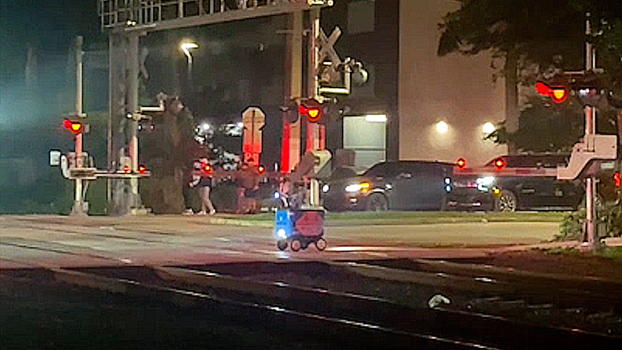 See it: Video captures train smashing into food delivery robot