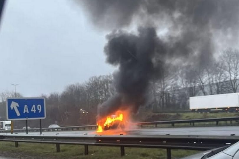 Horrifying moment car bursts into flames after crash on M62