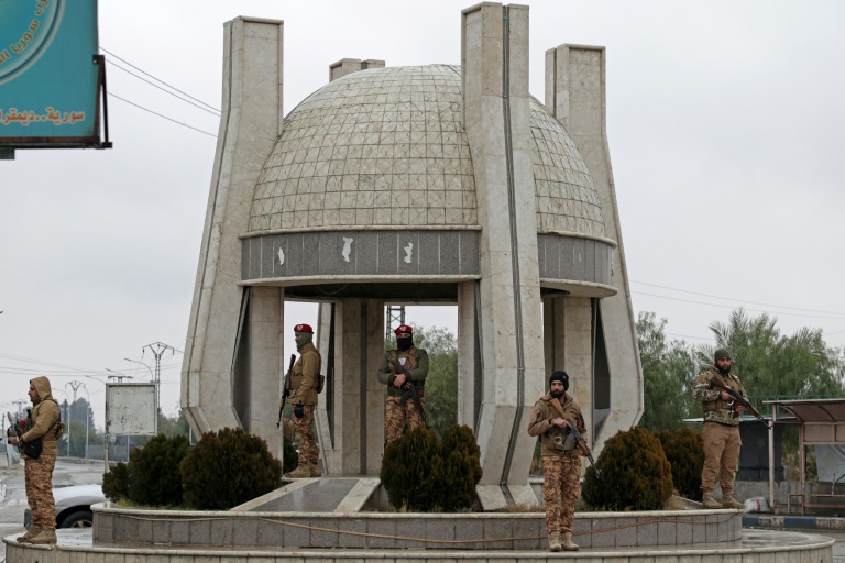 Syria's leader agrees truce with Kurds after govt troops advance