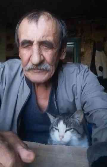 The man's happiness after getting love from his cat 😻