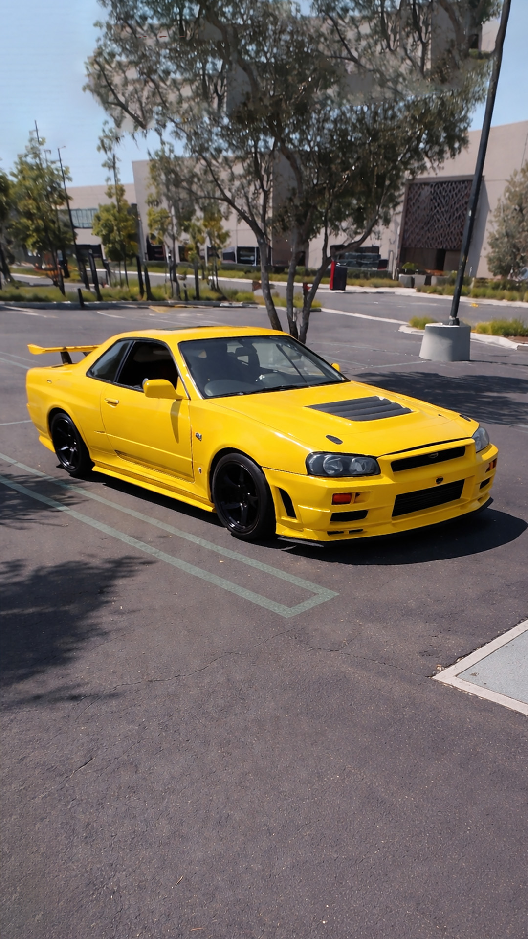 Driving a Nissan Skyline R34 in a banana costume