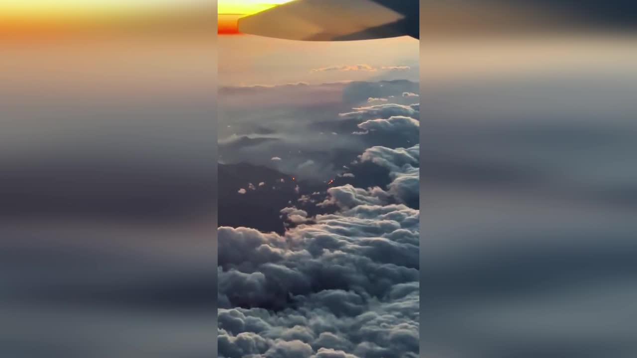 Wildfire smoke seen from plane flying over Chile
