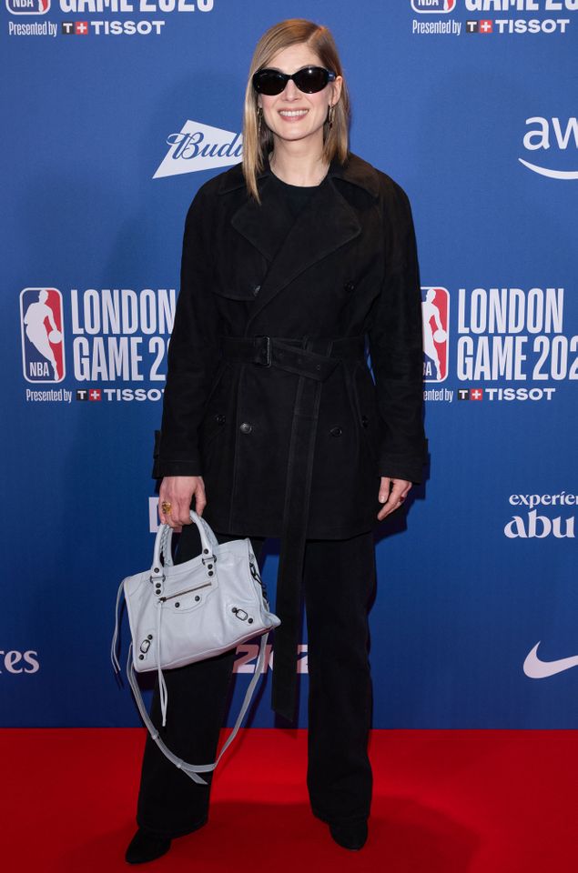 Rosamund Pike makes rare public appearance with son Atom, 11, at NBA ...